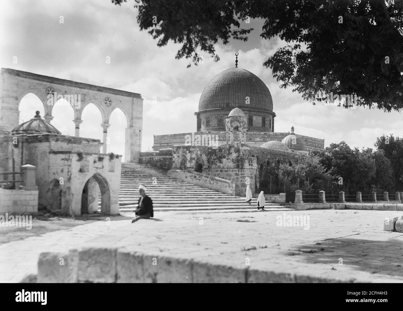 Original Caption: Dome of the Rock. Exteriors closer up with tree ...