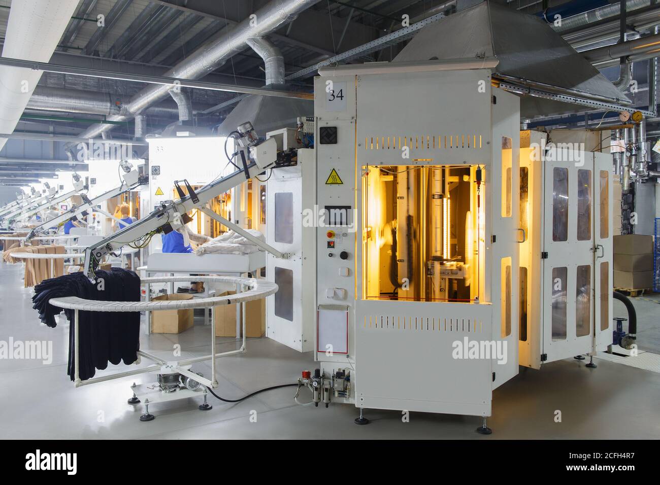 View of the machine for tights quality visual control automation on a ...