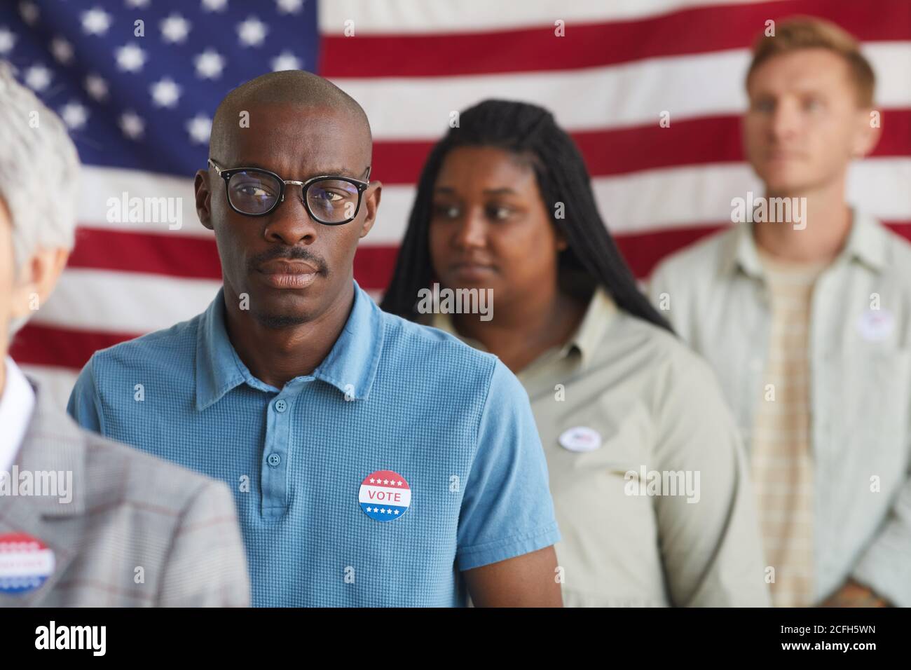 Diverse people american flag hi-res stock photography and images - Alamy