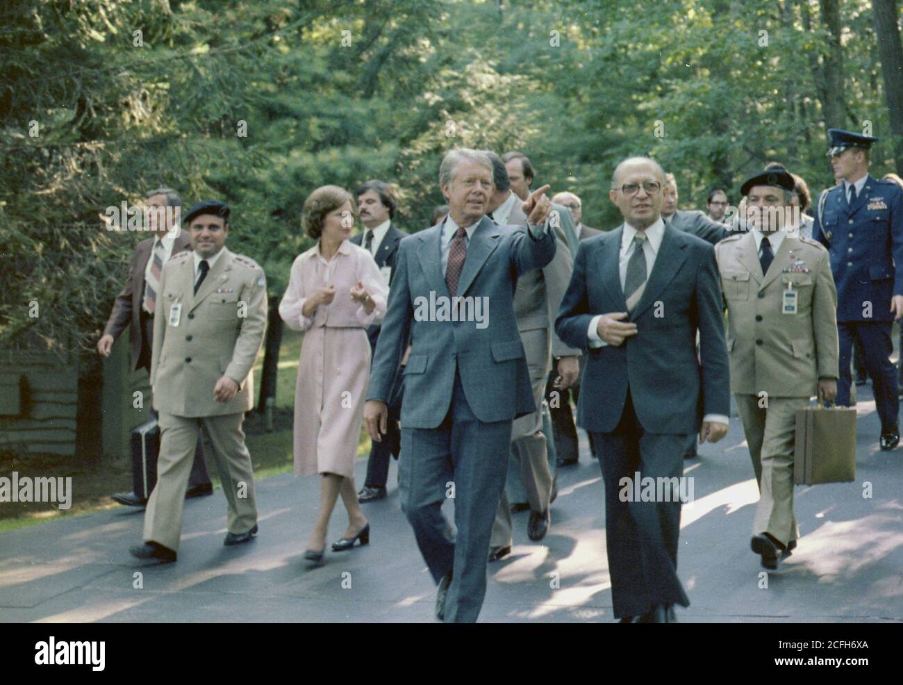 Jimmy Carter and Menahem Begin stroll along the paths of Camp David ...