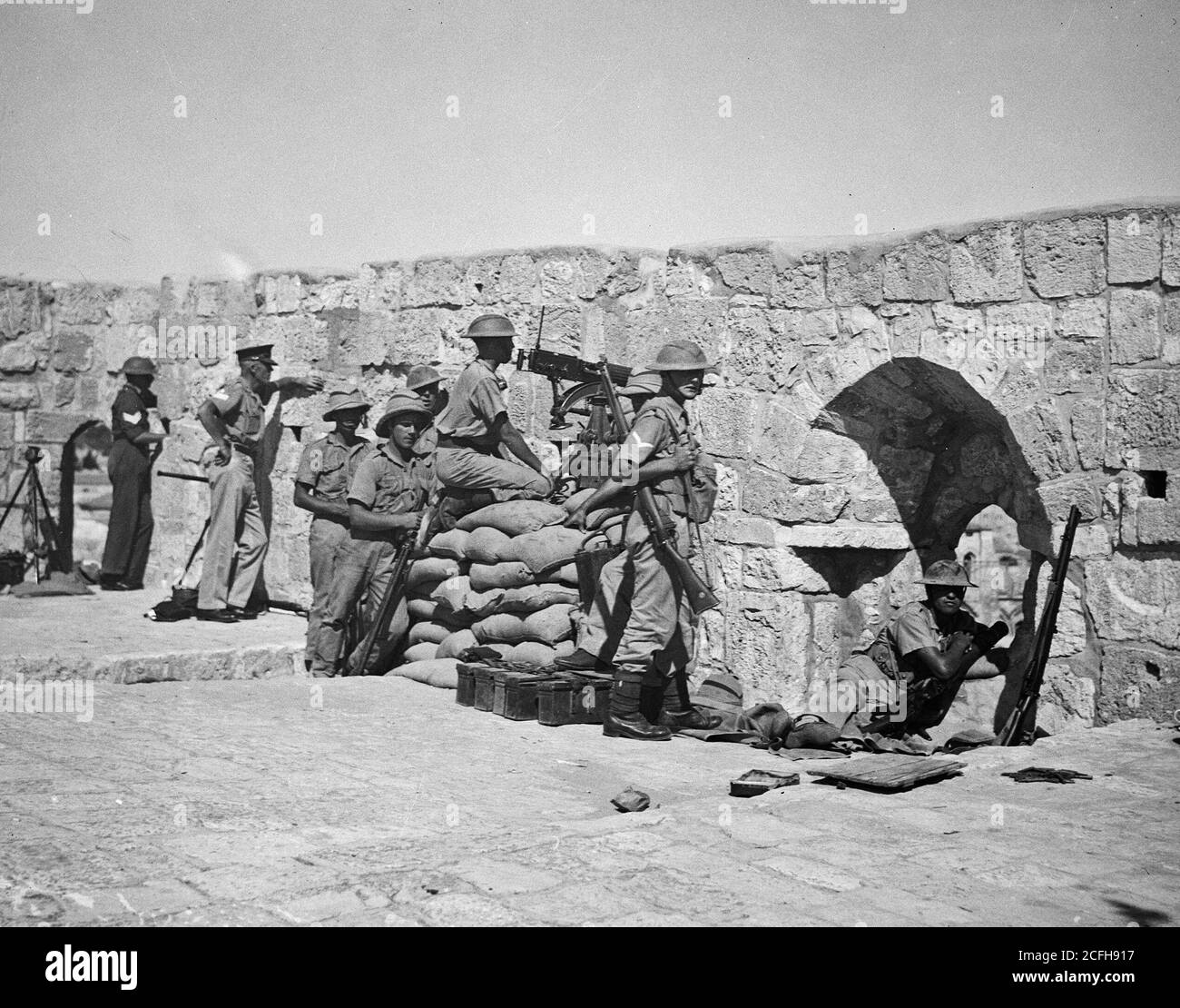 Original Caption: War-like scene on roof of Tower of David mounted ...