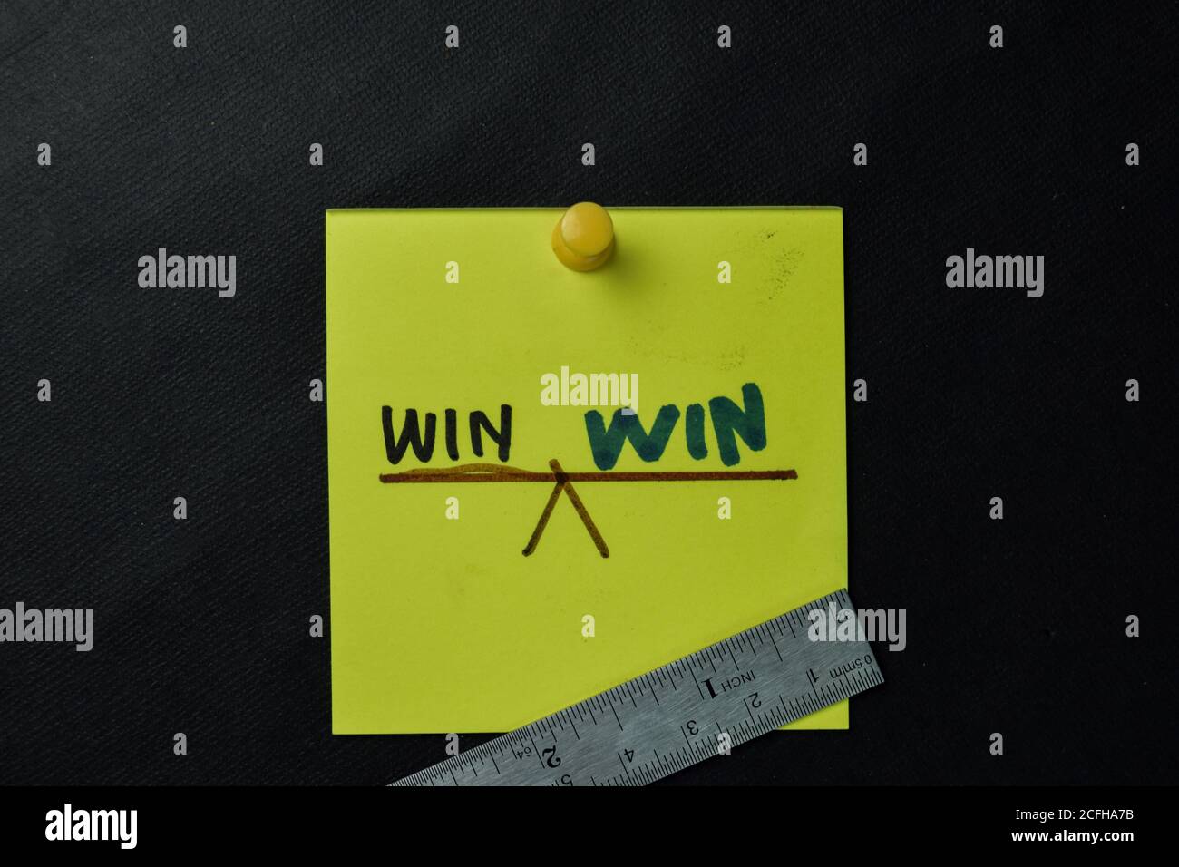 Win Win write on sticky notes isolated on office desk Stock Photo - Alamy