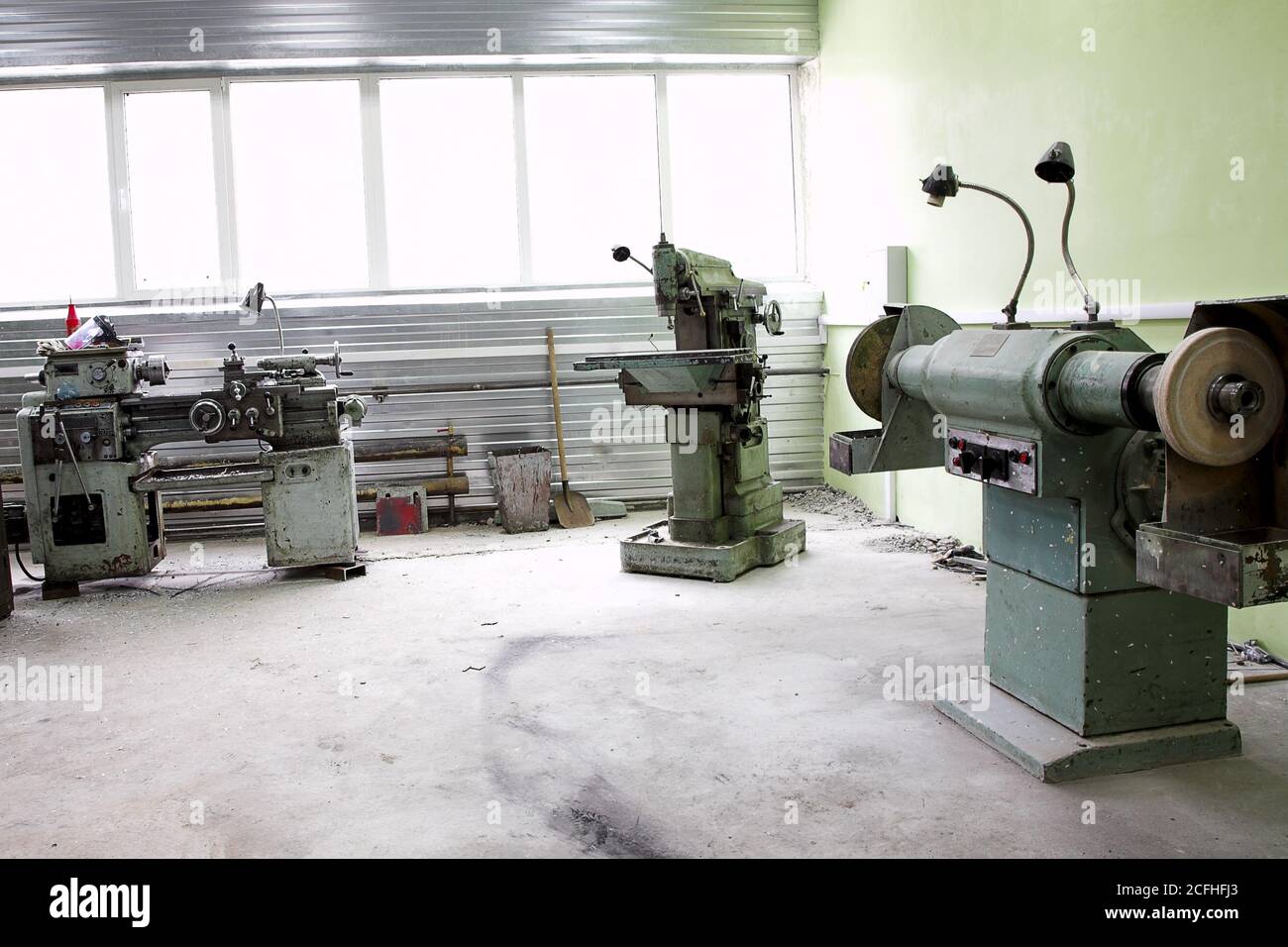 dirty industrial room with big machine tools Stock Photo - Alamy