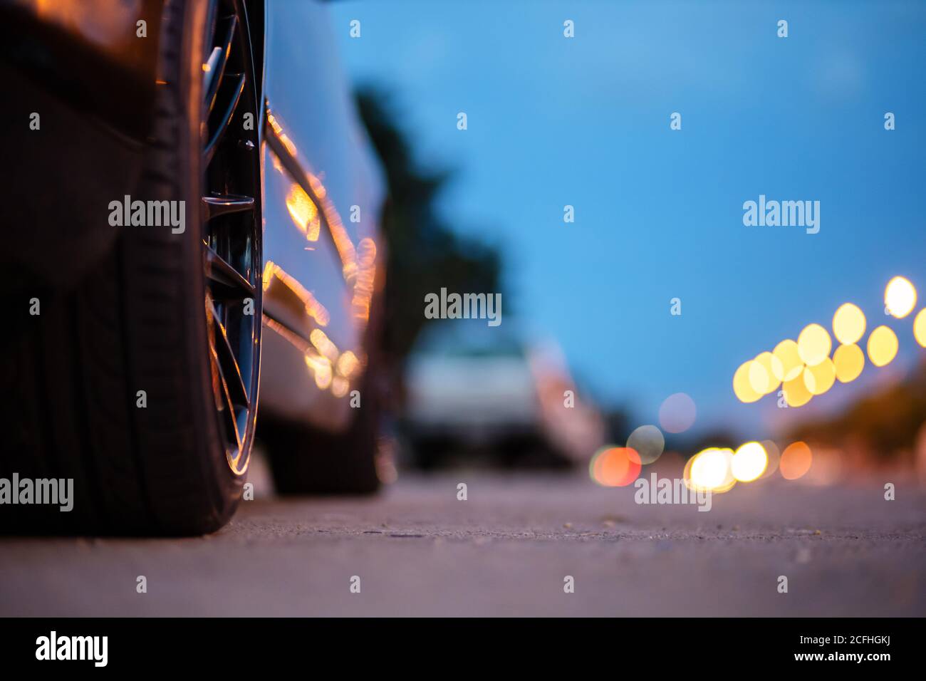 Car wheel at night park Stock Photo - Alamy