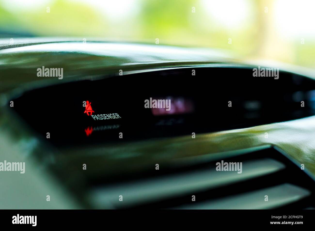 Alert light passenger in car Stock Photo - Alamy