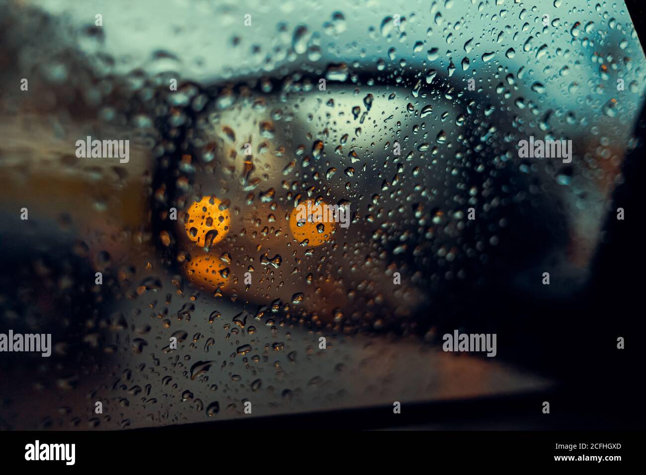 Blurred rain drop on the car glass background, water drops at the car ...