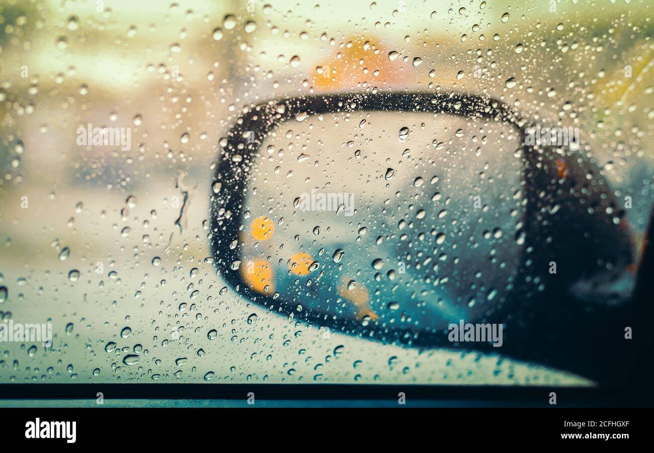 Blurred rain drop on the car glass background, water drops at the car ...