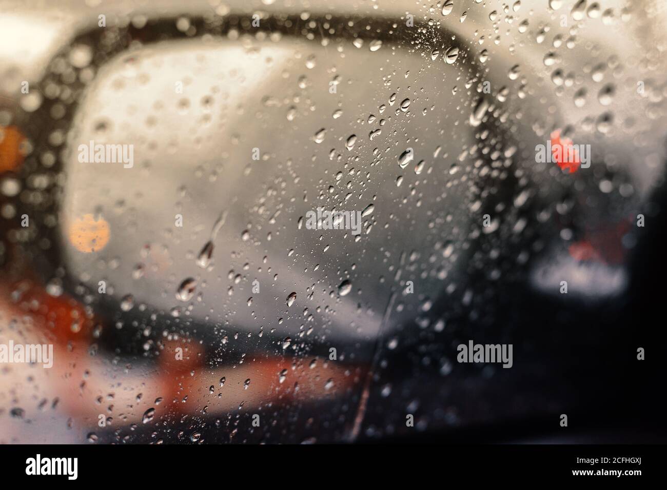 Blurred rain drop on the car glass background, water drops at the car ...