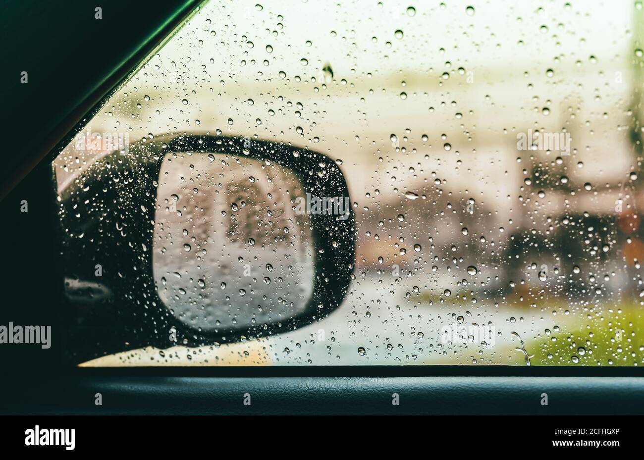 Blurred rain drop on the car glass background, water drops at the car ...