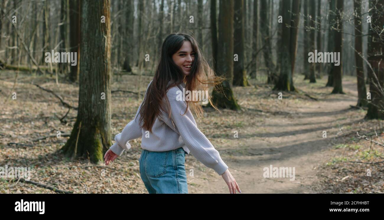 Turning back on her hi-res stock photography and images - Alamy