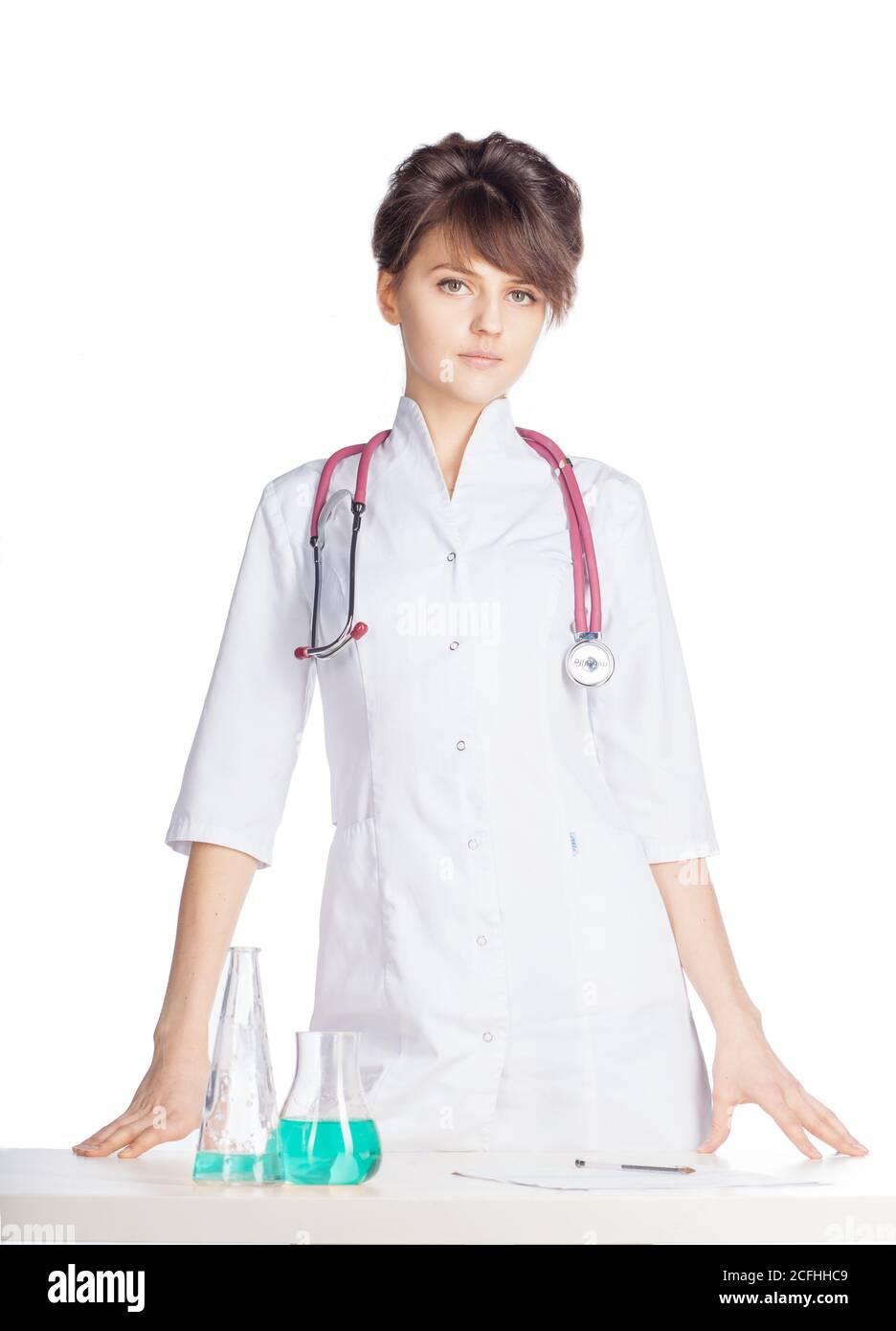 young beautiful caucasian female doctor isolated on white background Stock Photo - Alamy