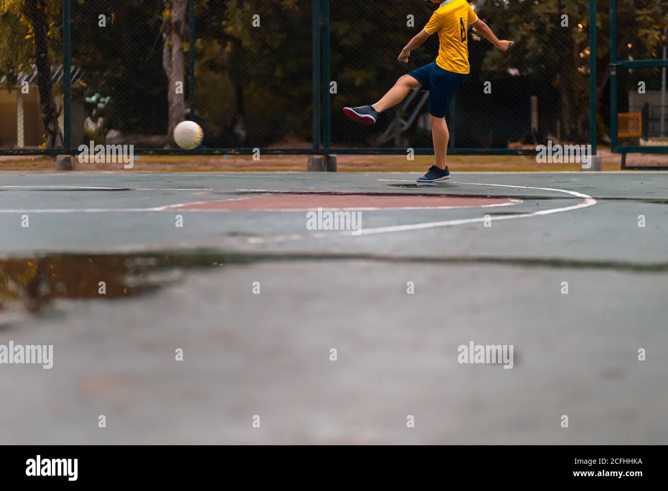 A children practice futsal in the park Stock Photo - Alamy