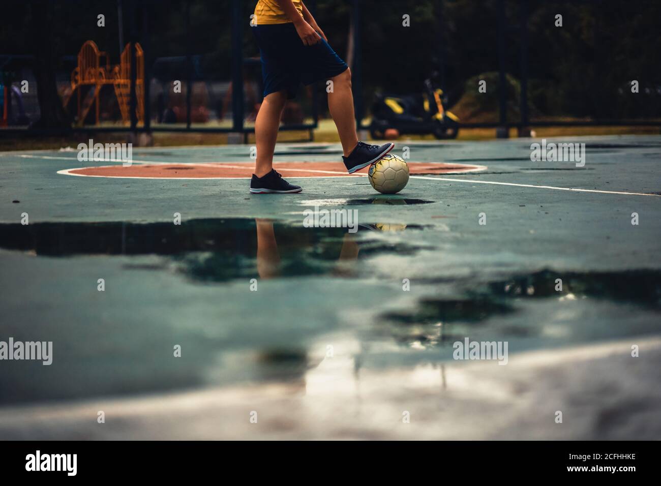 A children practice futsal in the park Stock Photo - Alamy
