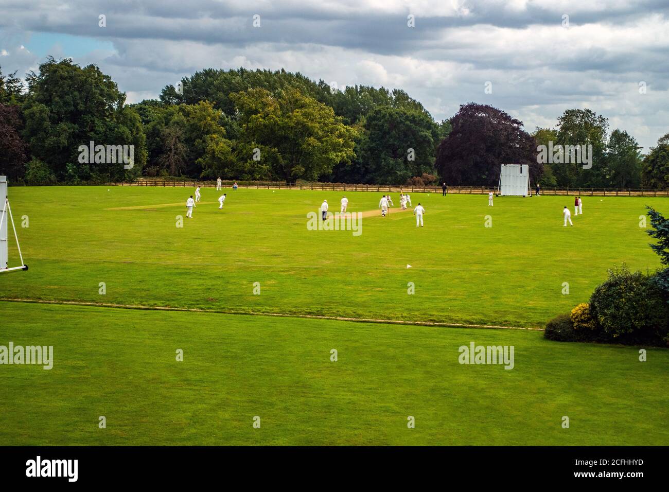 Wiseton Cricket Club, playing in their village cricket pitch in summer ...