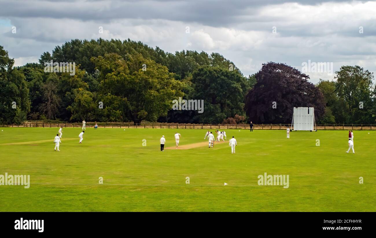 Wiseton Cricket Club, playing in their village cricket pitch in summer ...