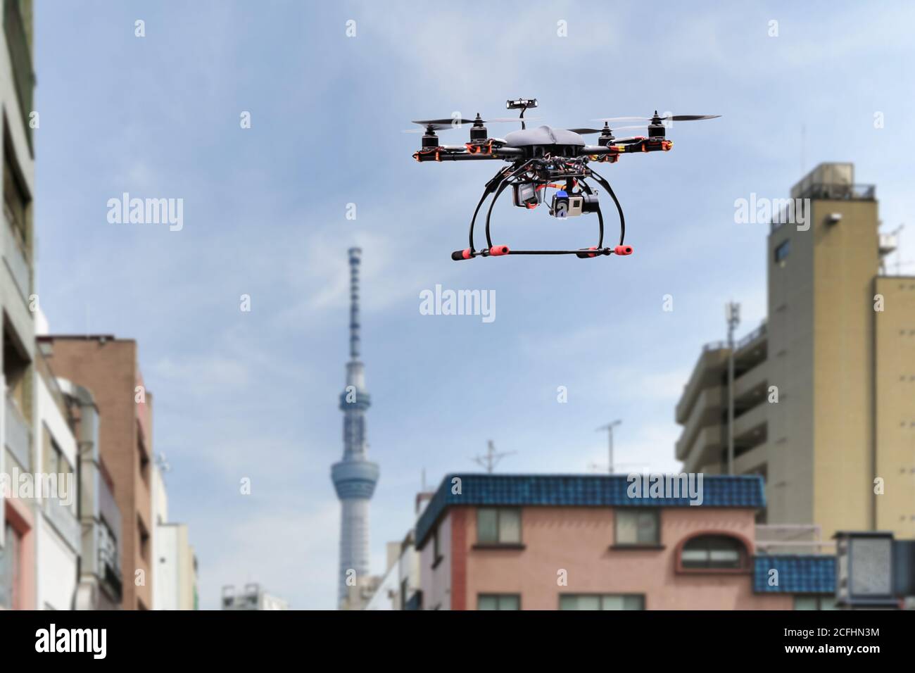 Quadrocopter mounted camera flying in hi-res stock photography and ...