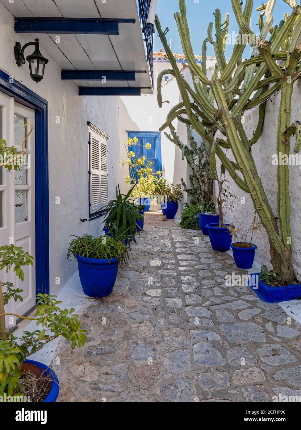 Three colors: blue, white and green alley, Hydra island Greece Stock ...