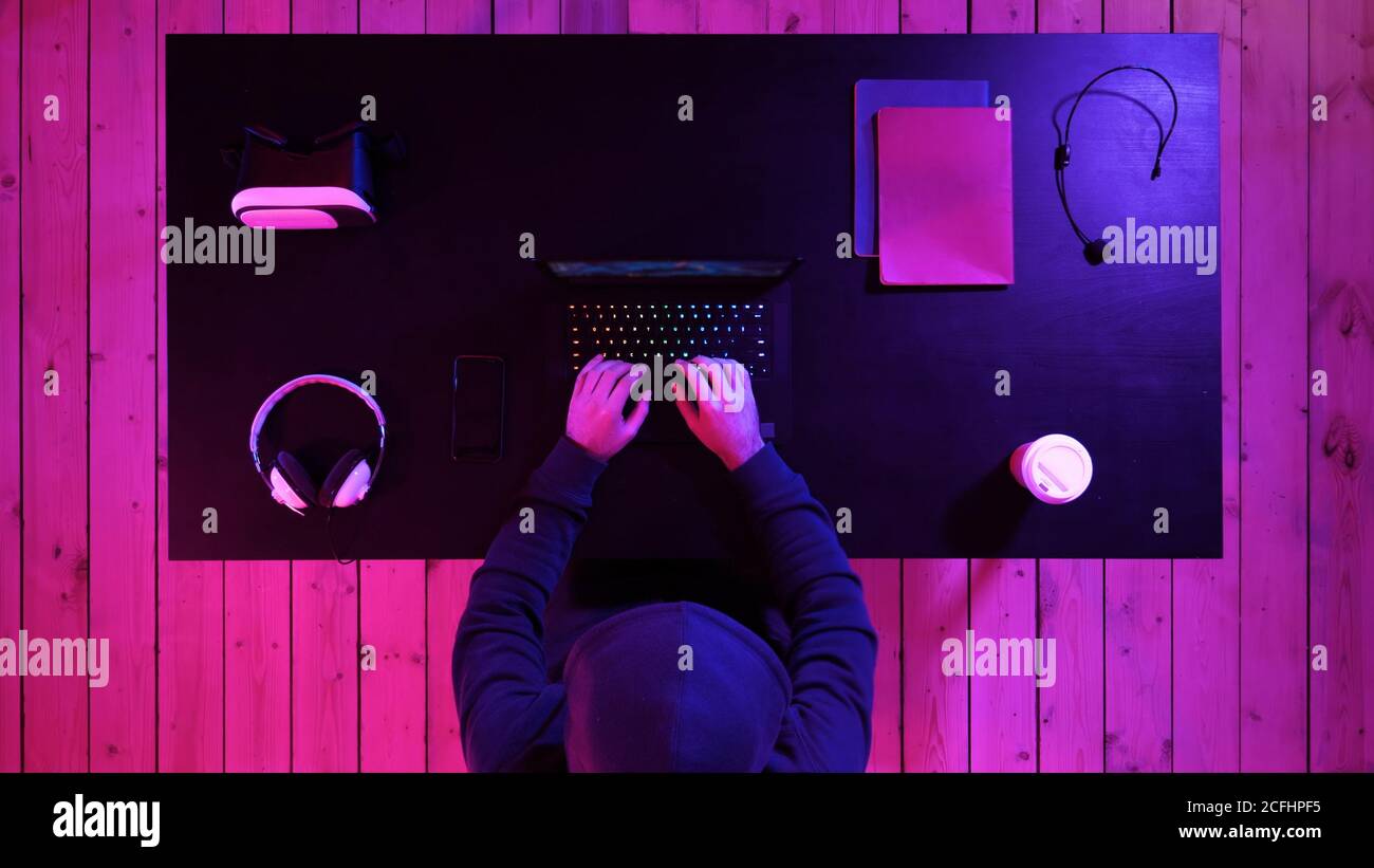 Gamer playing a game on a laptop. Streaming and watching others play ...