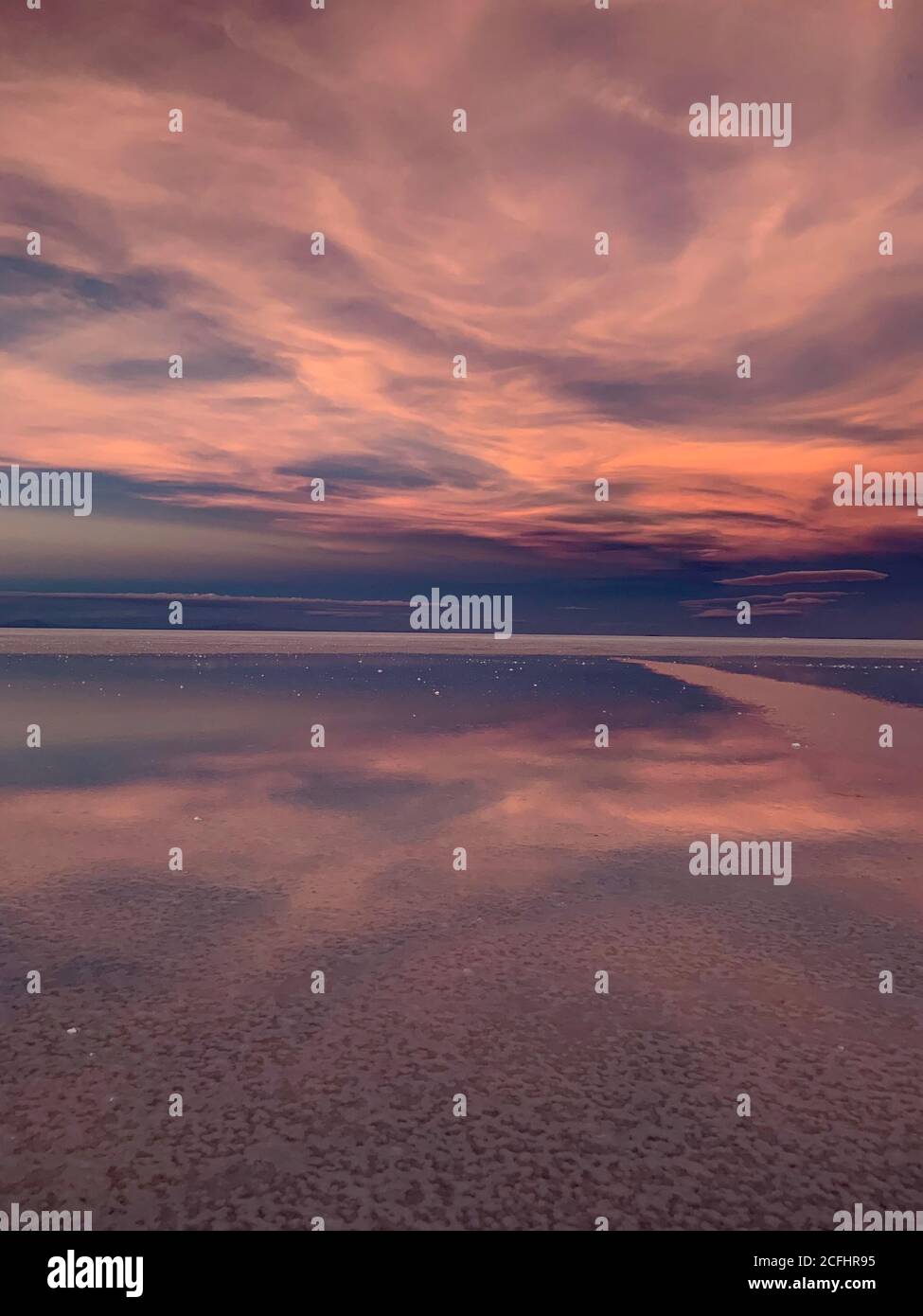 Magical sunset heaven cloudscape reflection in the calm sea water ...