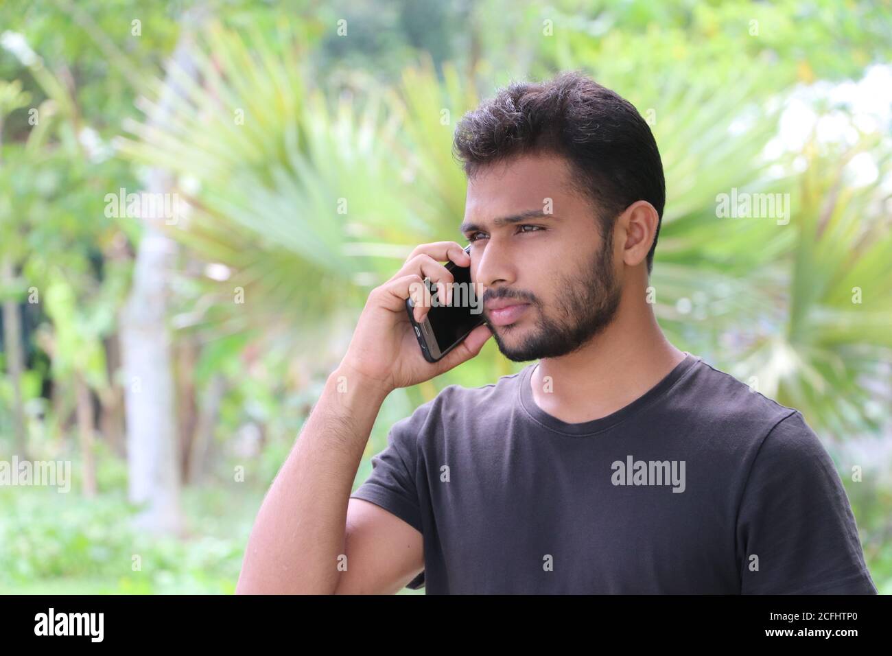 Asian man talking hi-res stock photography and images - Alamy