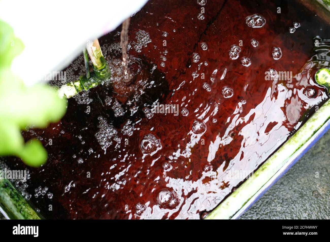 liquid fertilizer mixing in bucket for growing hydroponic vegetable ...