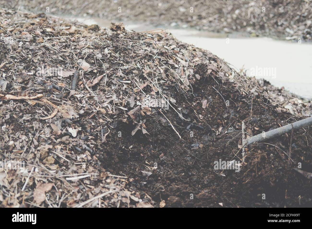 organic compost heap. fertilizer production for soil cultivation in ...