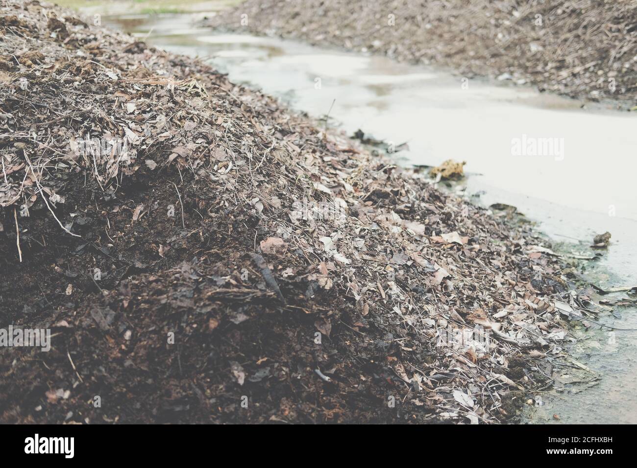 organic compost heap. fertilizer production for soil cultivation in ...