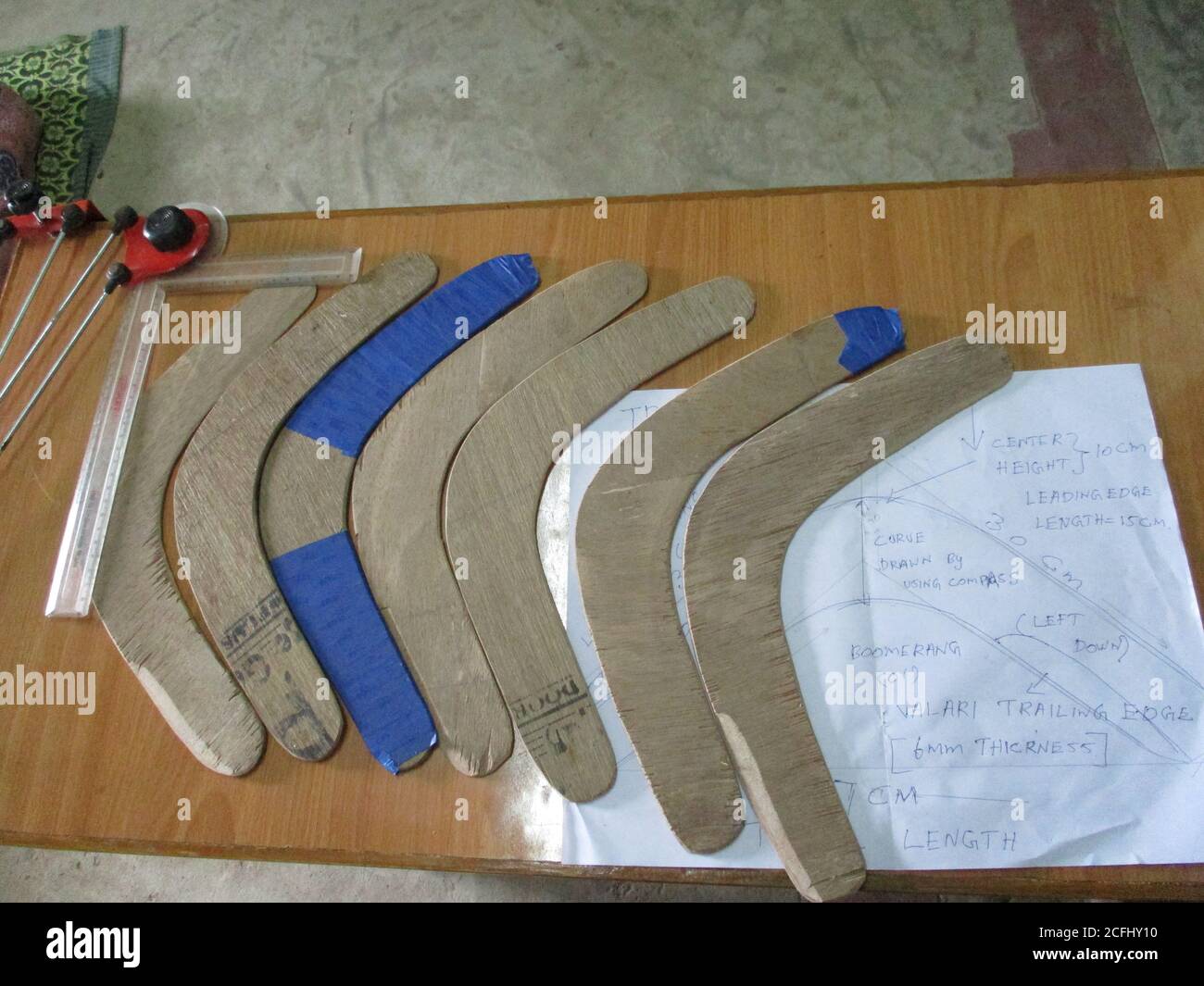 wooden boomerang making and throw Stock Photo - Alamy