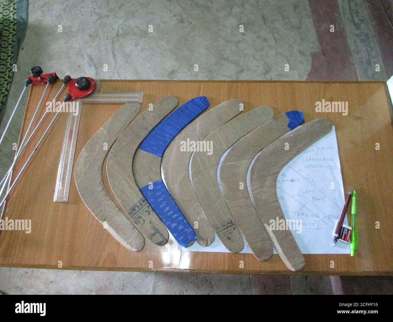 wooden boomerang making and throw Stock Photo - Alamy