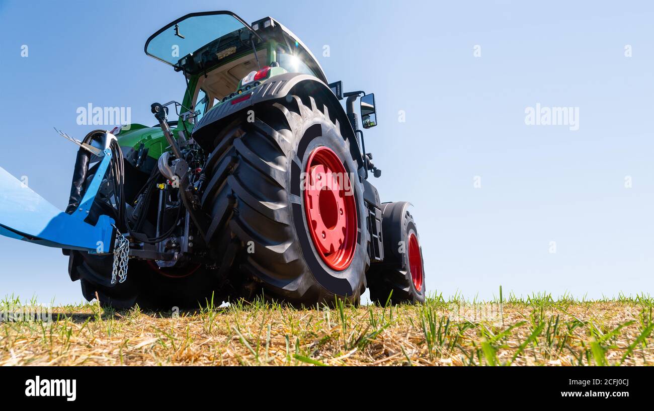 Red tractor on agricultural hi-res stock photography and images - Alamy