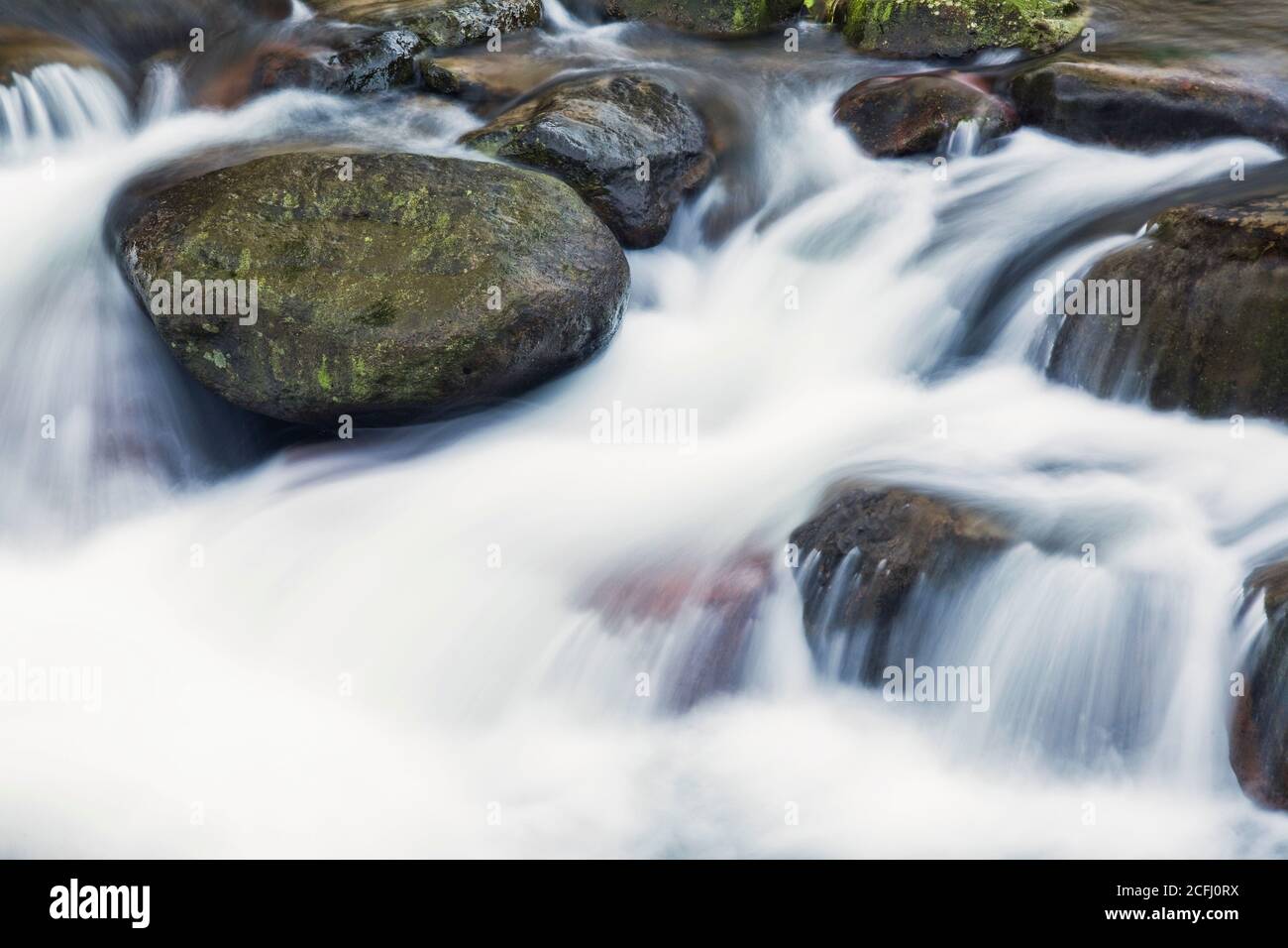 The stone under the waterfall, close-up waterfall as background Stock ...