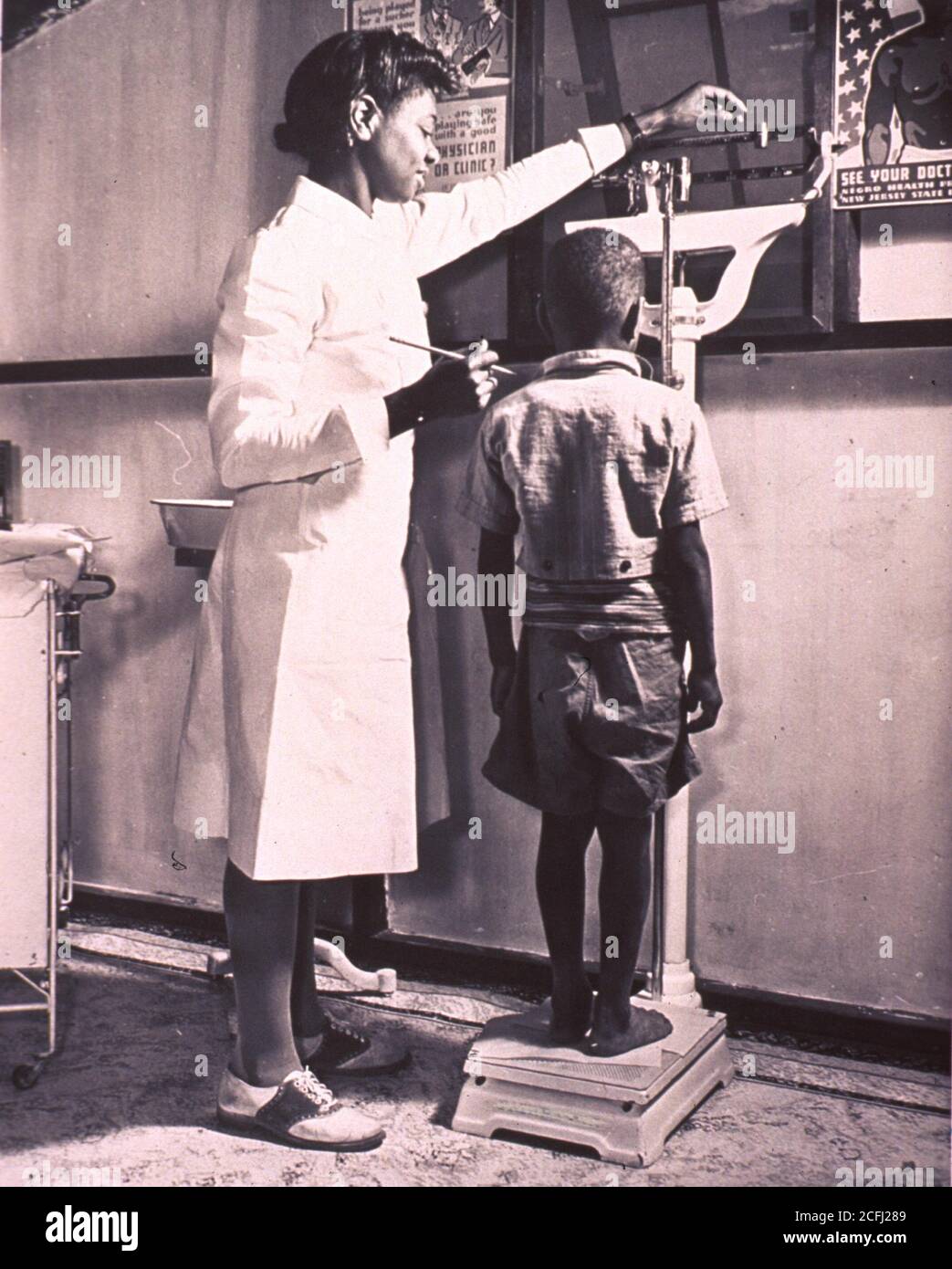 Nurse Weighing Child High Resolution Stock Photography and Images - Alamy