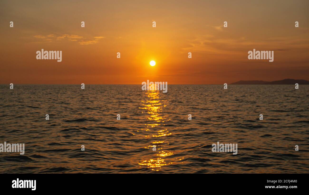 Beautiful abstract unfocused sunset over the sea. Blurry background for ...