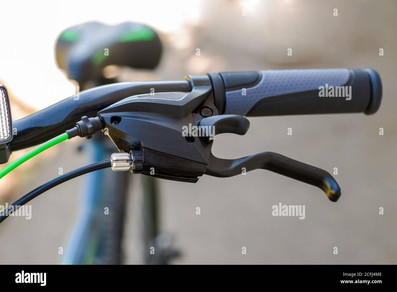 bicycle handlebars brake control knob and gear shift knob close-up ...