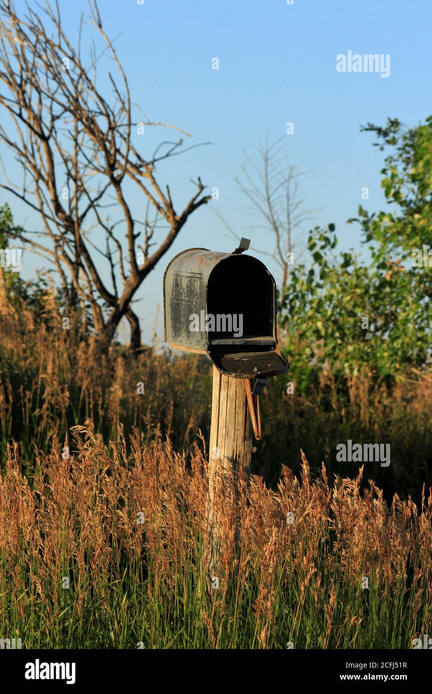 Kansas Country mailbox with tree's,blue sky, and grass out in the ...
