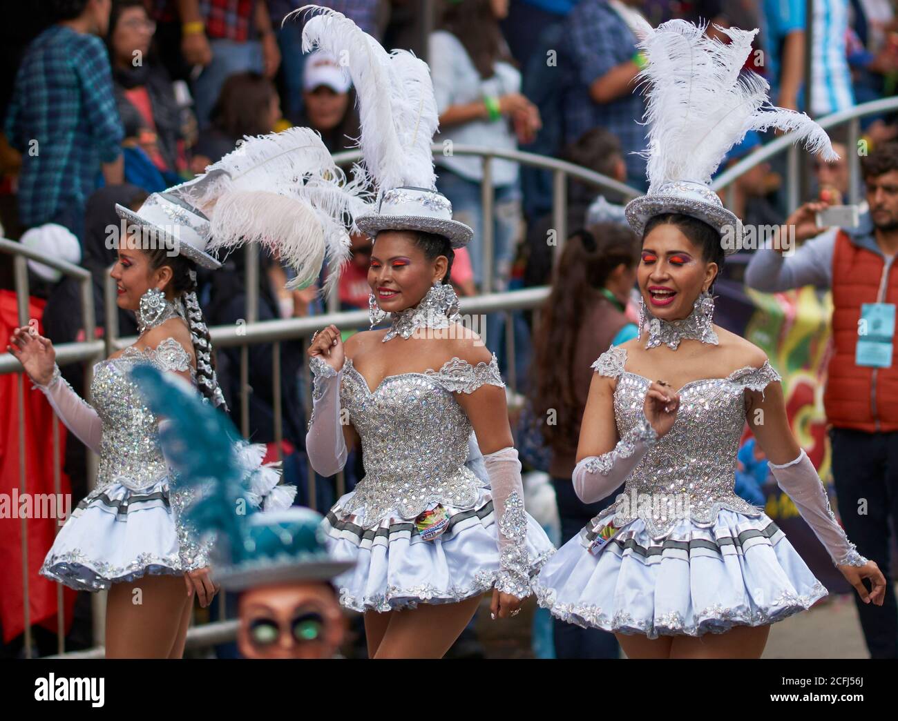Morenada dancers in ornate costumes parade through the mining city of ...