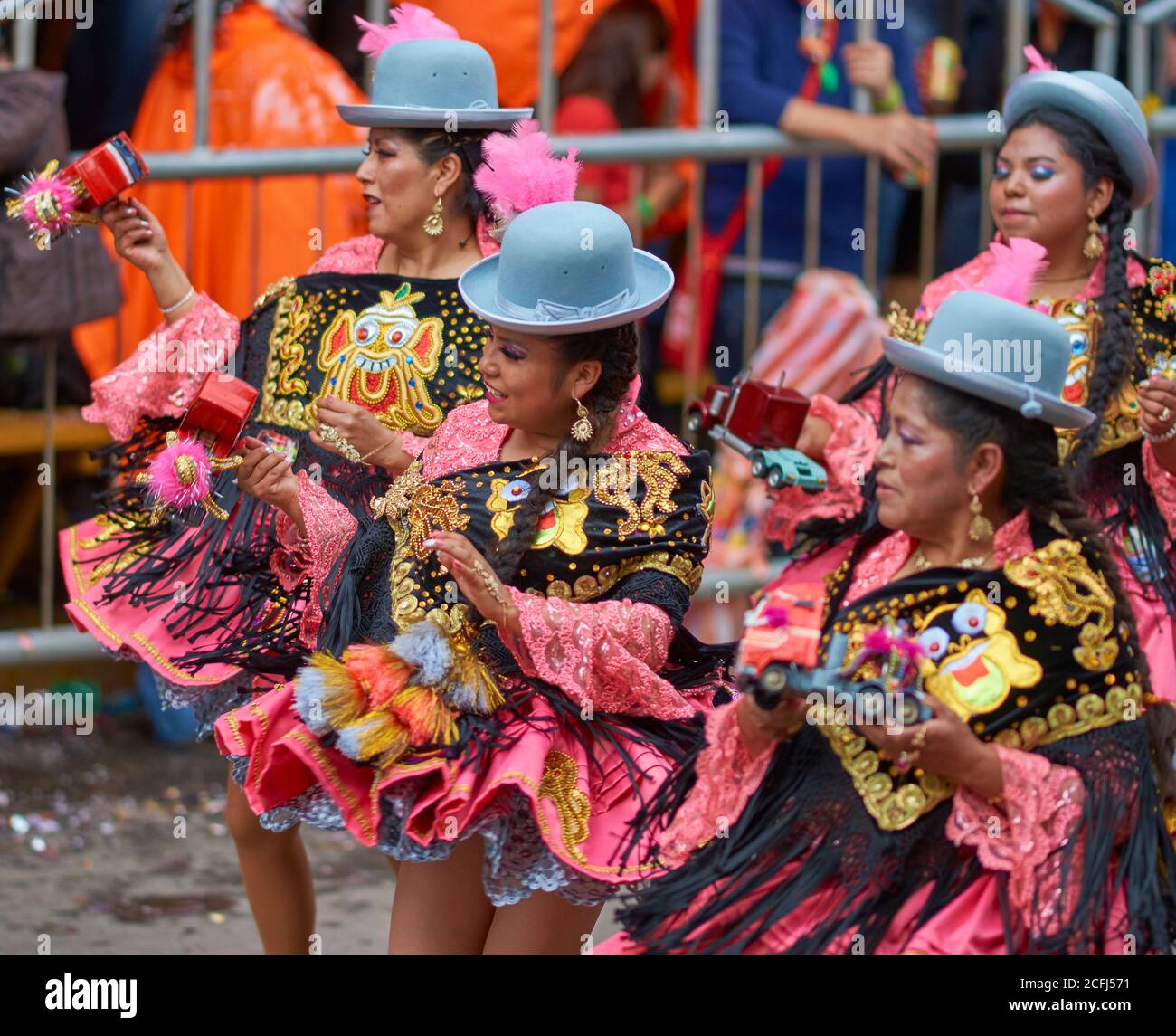 Morenada dancers in ornate costumes parade through the mining city of ...