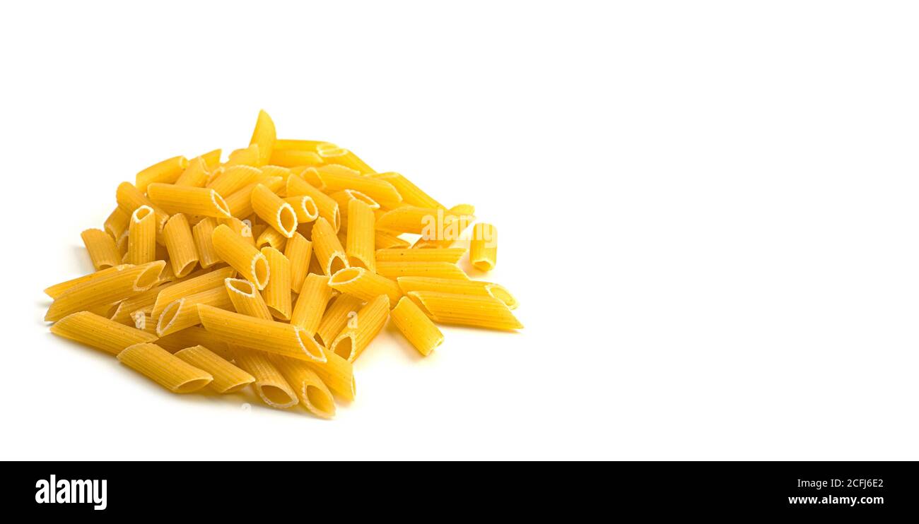 Raw penne rigate shape of italian pasta on white background. High ...