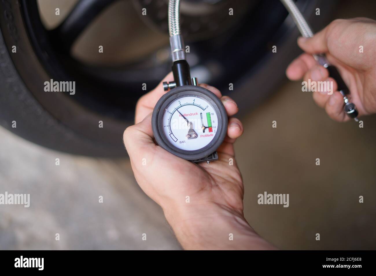 Wheel pressure hi-res stock photography and images - Alamy