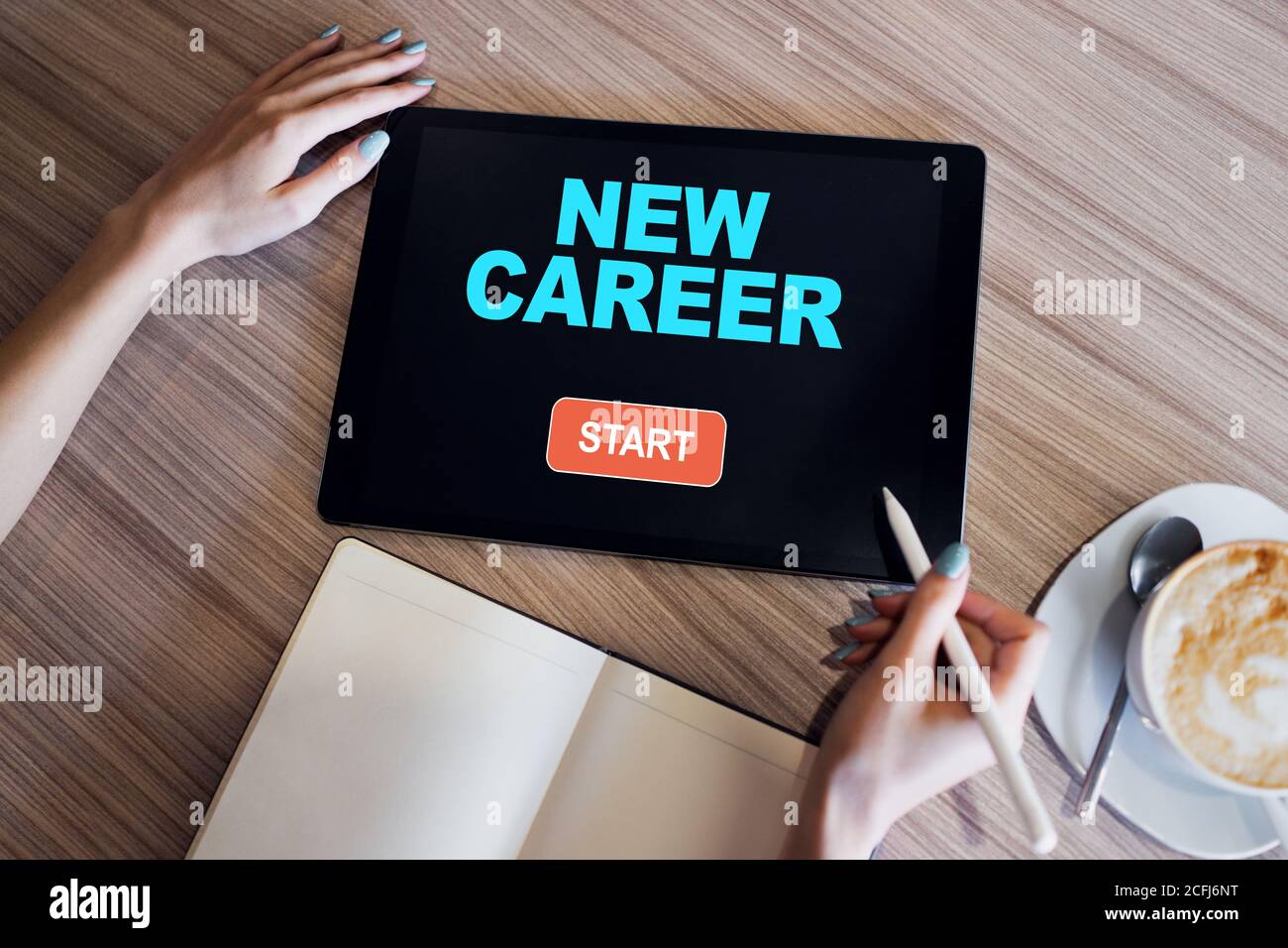 Start new career button on device screen. Recruitment and personal ...