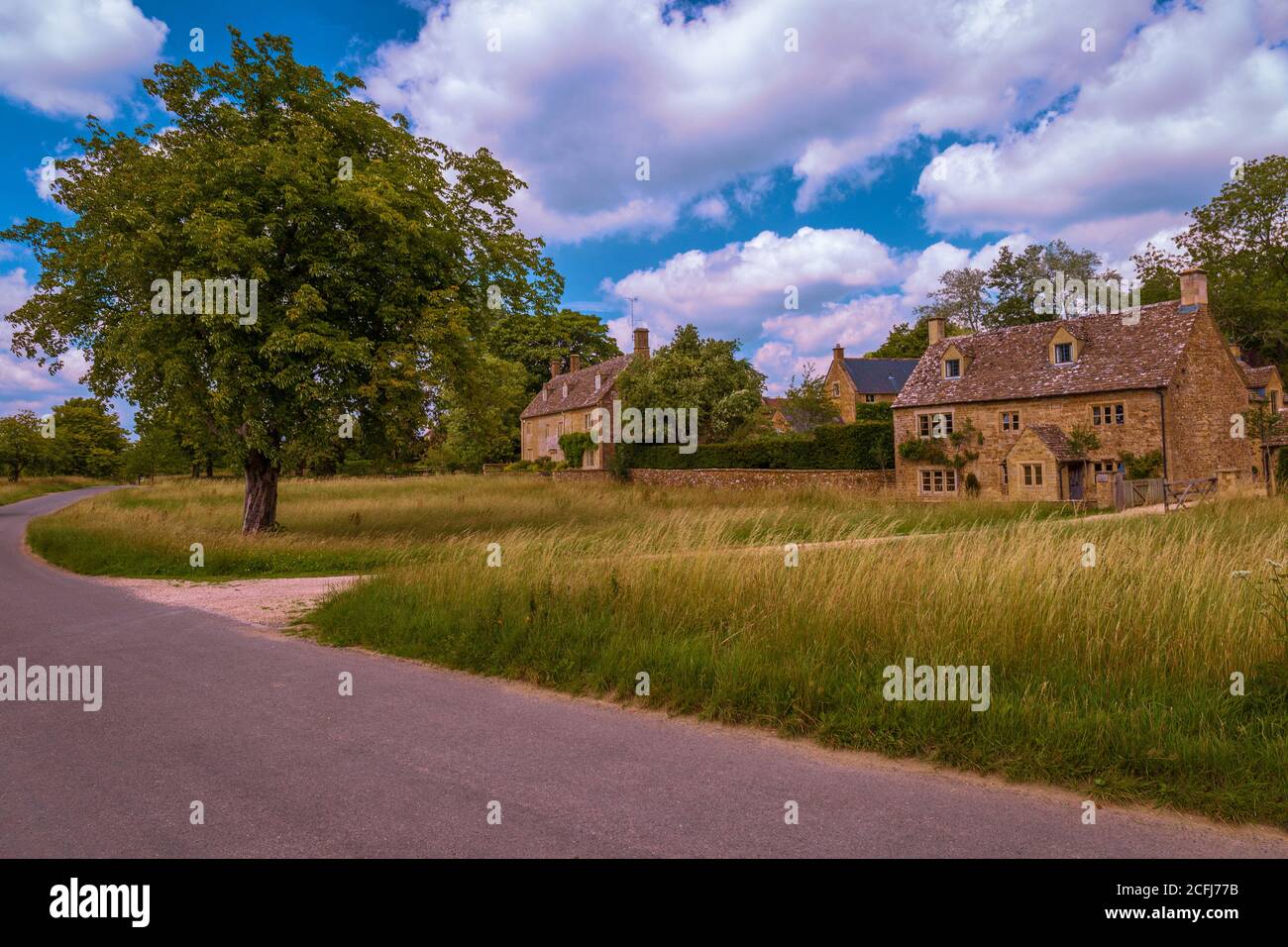 Cotswold stone cottage in the small village of Wyck Rissington Stock ...