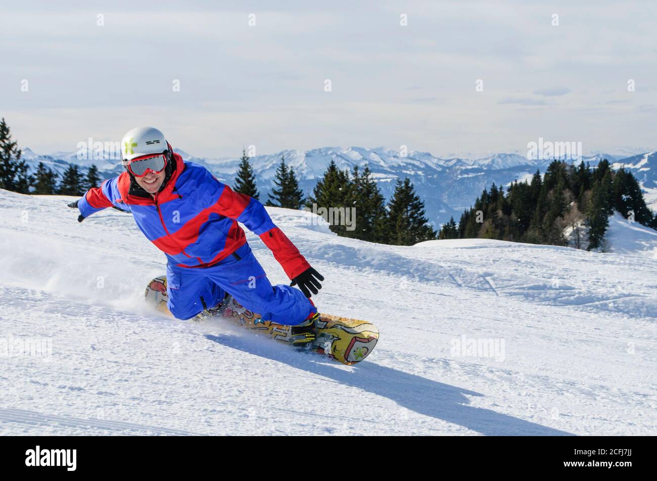Snowboarder on slope Stock Photo - Alamy