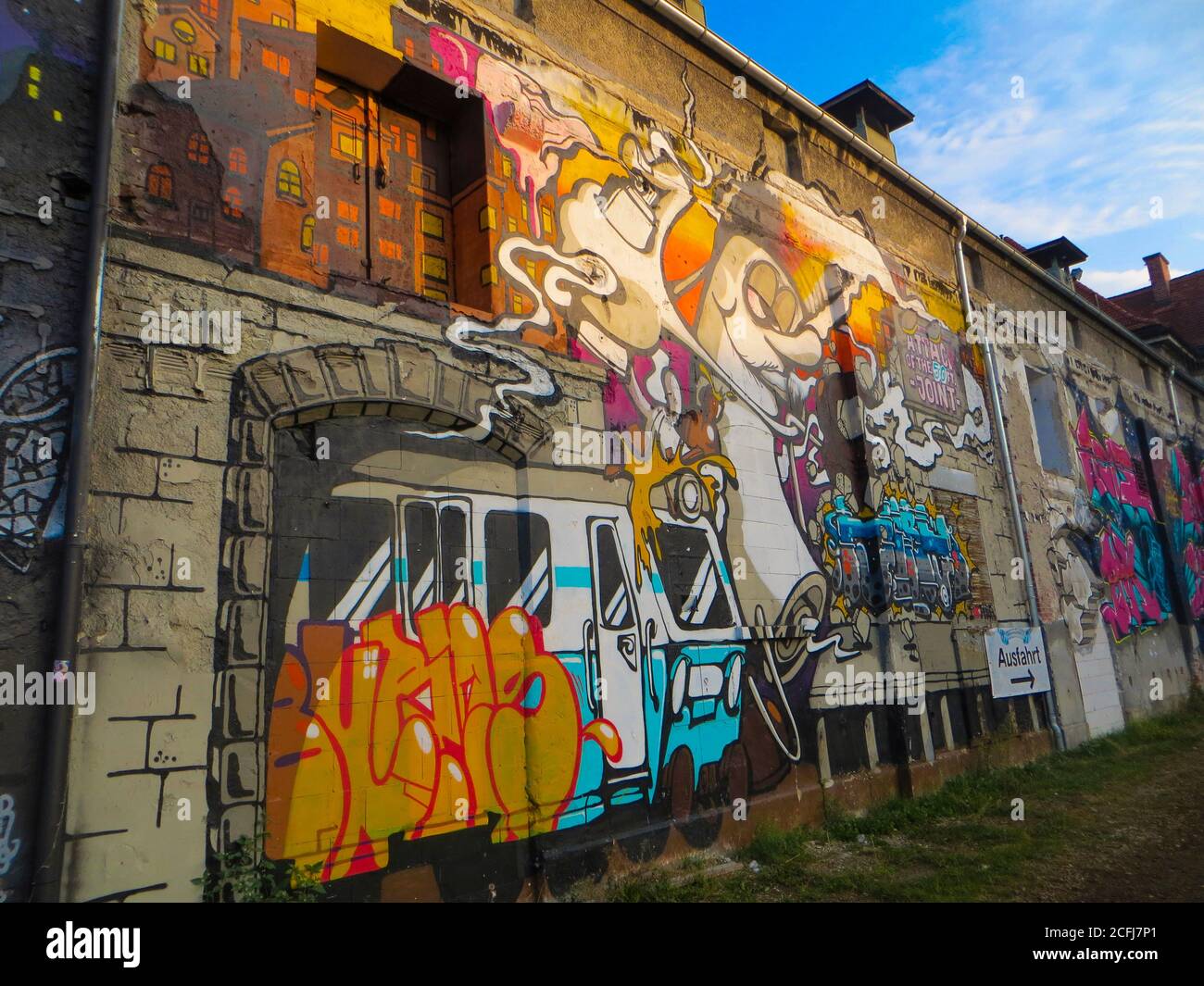 Munchen, Bavaria, Germany. Street art. Murals on the walls of a parking ...