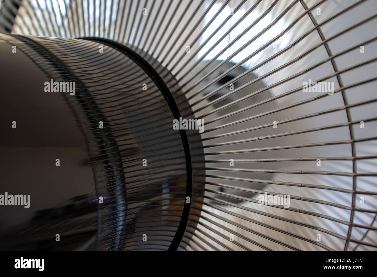 Roma. The blades of a fan spin quickly to relieve the sweltering heat ...