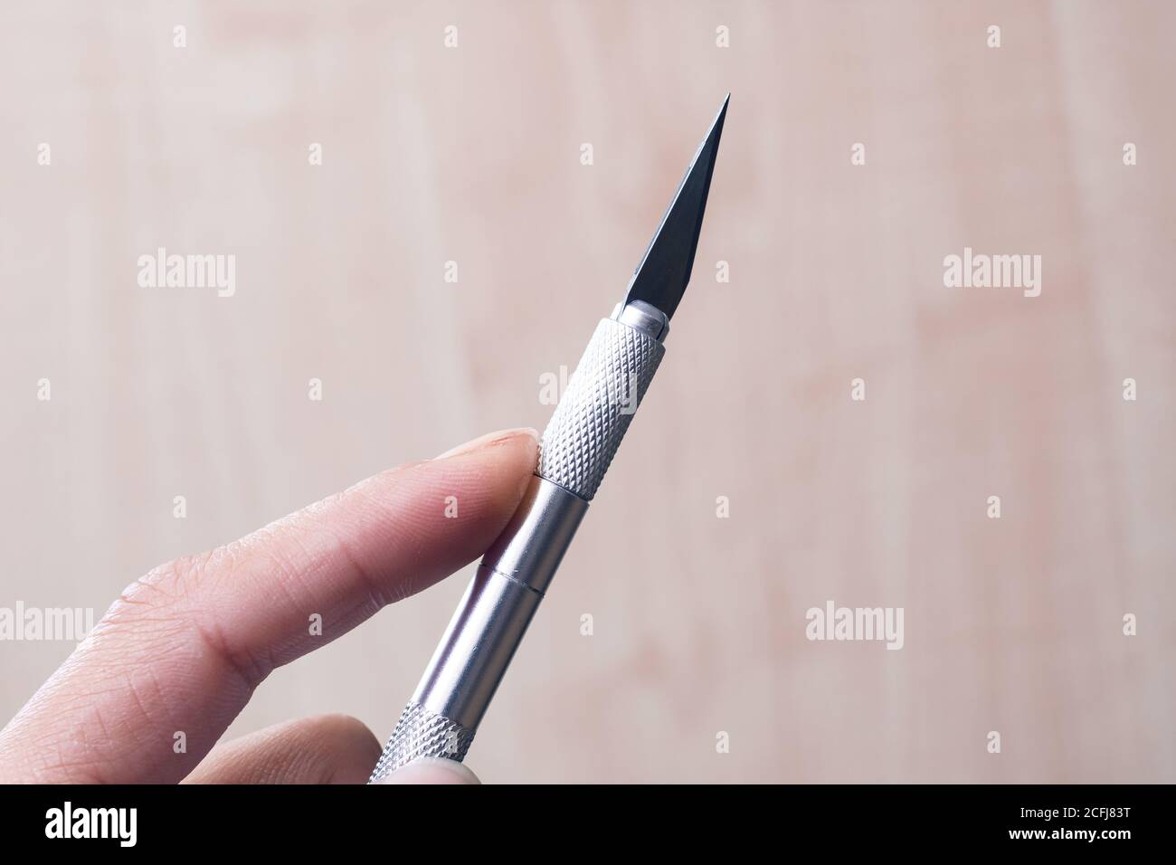 Scalpel in hand hi-res stock photography and images - Alamy