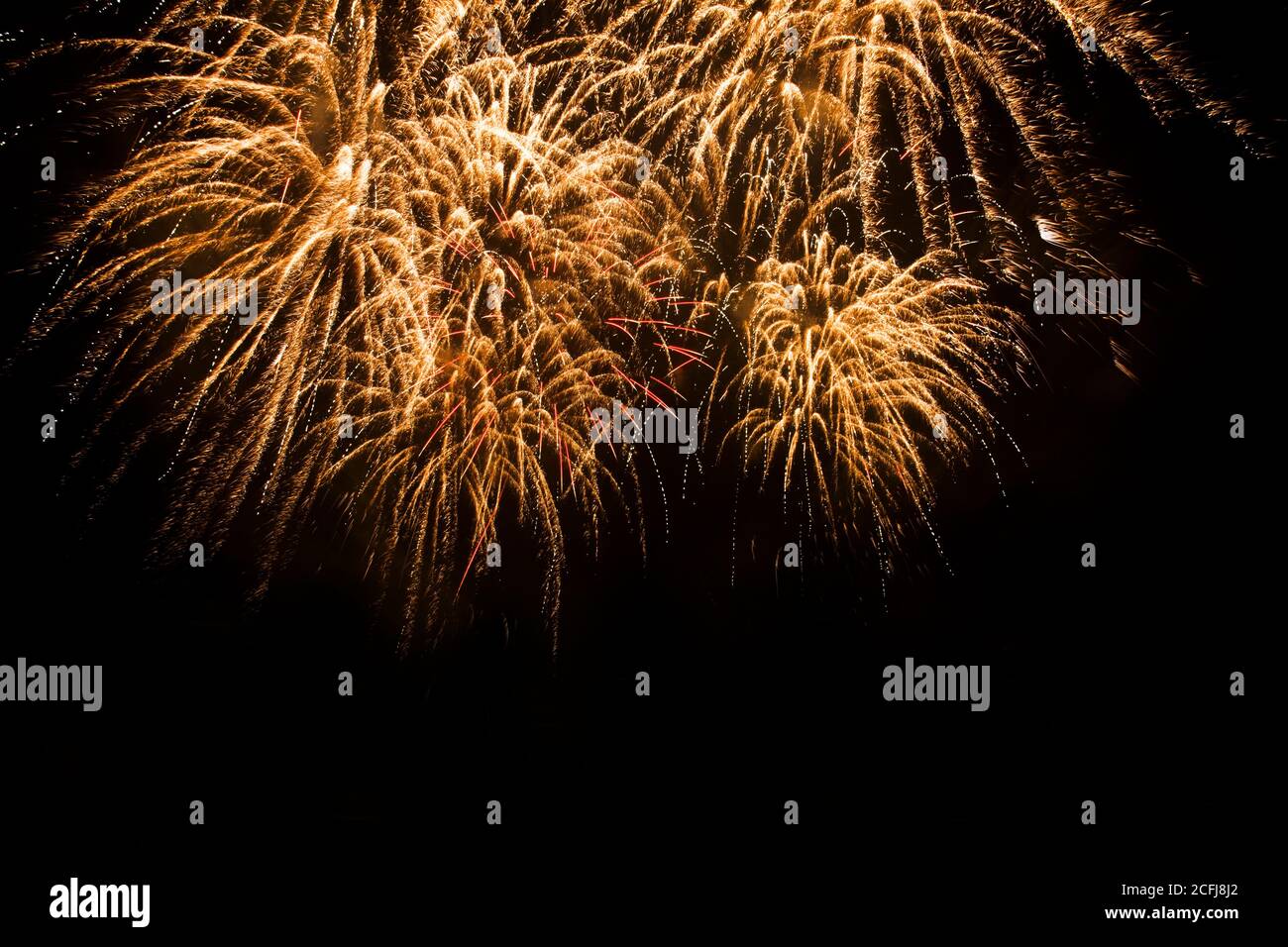 Colorful fireworks in black background Stock Photo - Alamy