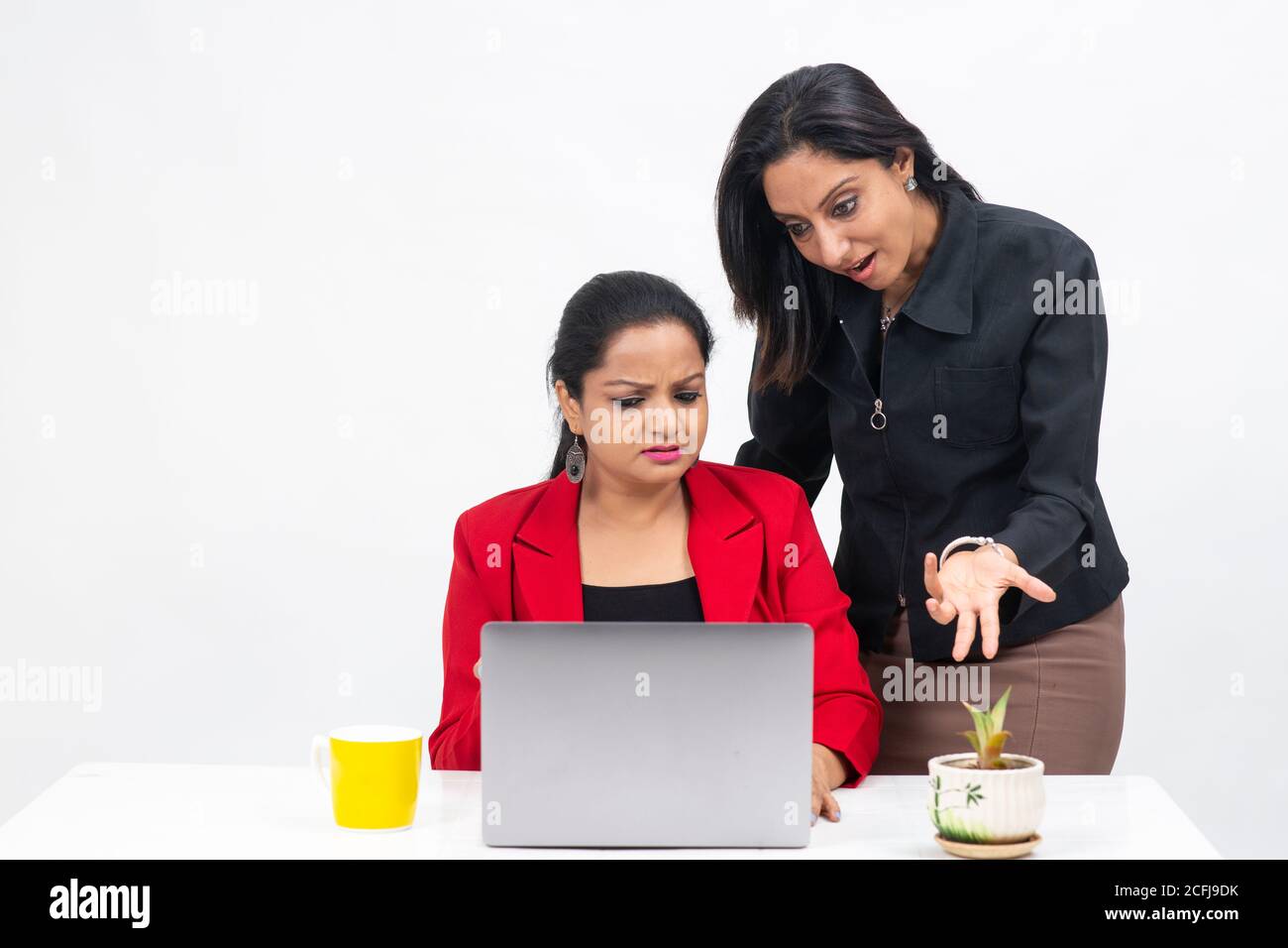Two indian women colleagues hi-res stock photography and images - Alamy