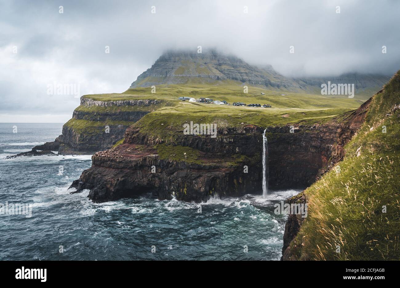 Gasadalur village and Mulafossur its iconic waterfall, Vagar, Faroe ...