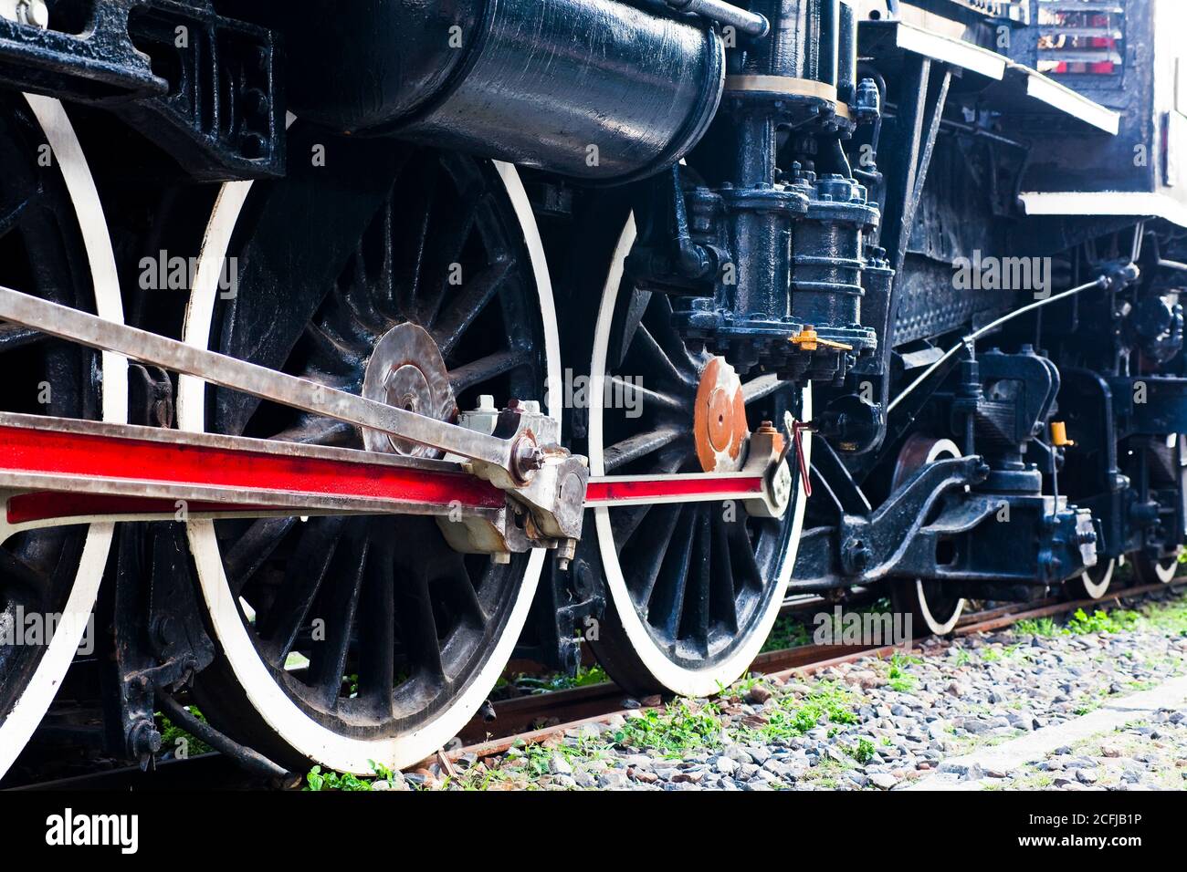 Industrial rail car wheels closeup photo Stock Photo - Alamy