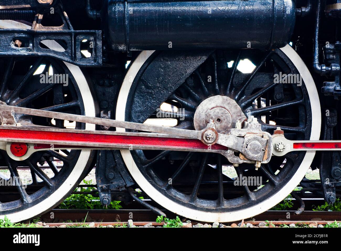 Industrial rail car wheels closeup photo Stock Photo - Alamy